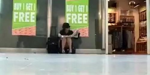 Sitting Upskirt At The Airport