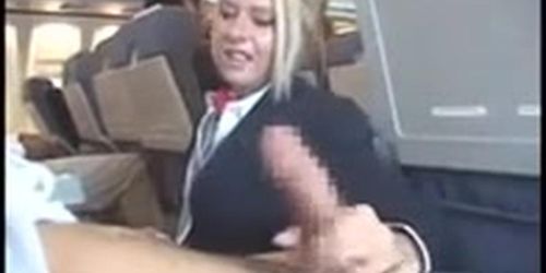 Handjob In Airplane With Sexy Stewerdess Riley Evans