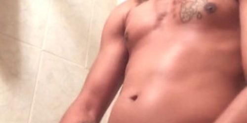 Dread Head With A Latex Glove Jerks Off In Shower